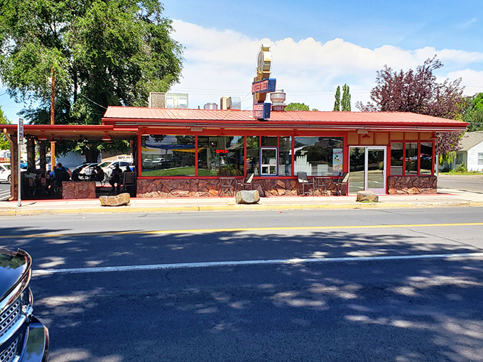 The iconic Tastee Treet sign stands as a beacon of hope for hungry travelers, promising burgers and fries that transcend fast food into the realm of culinary memory-making. 