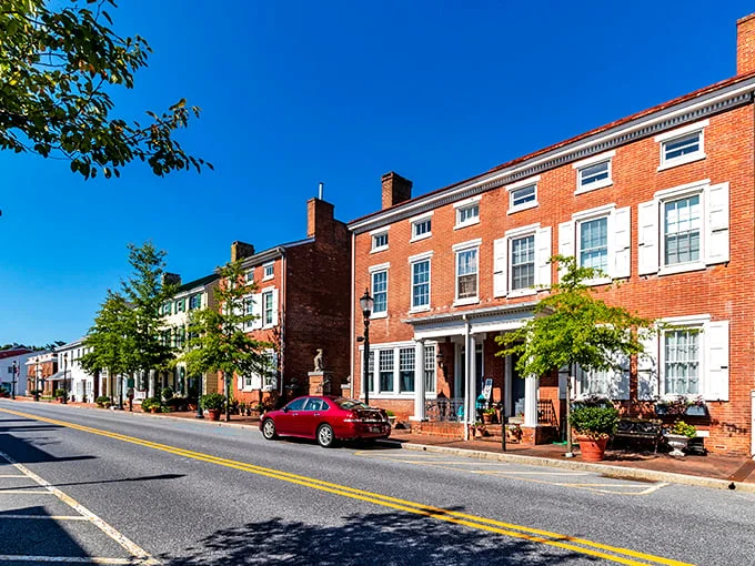 Smyrna's Main Street looks like it was designed by Norman Rockwell himself—pristine white buildings under impossibly blue skies that practically whisper "affordable retirement."