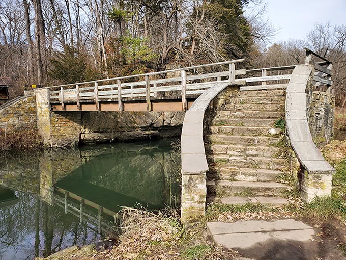 This stone bridge isn't just crossing water—it's crossing time. CCC craftsmanship from the 1930s that makes modern infrastructure look like a rushed homework assignment.