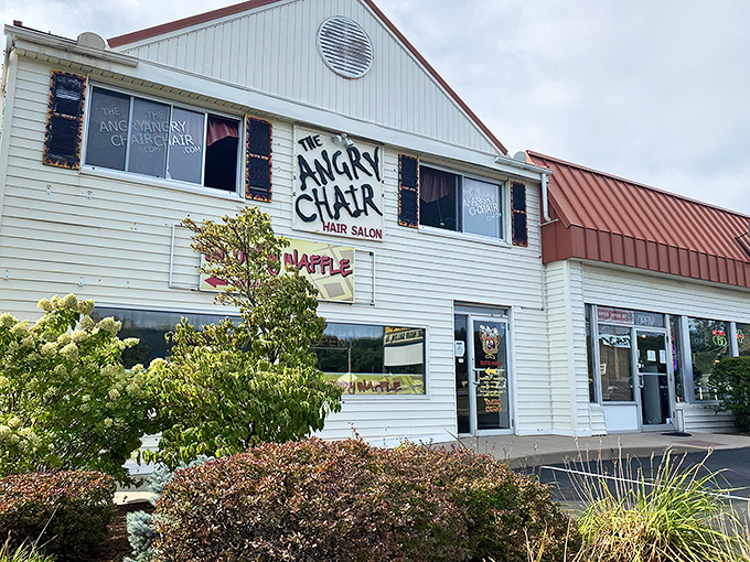 The unassuming exterior of The Sloppy Waffle shares space with The Angry Chair Salon—a pairing that somehow makes perfect sense in Connecticut's charming landscape.