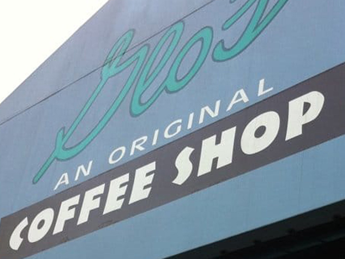 Glo's sleek new digs blend modern architecture with that classic diner charm. The wooden accents and glass frontage say "Yes, we've grown up, but we still remember where we came from."