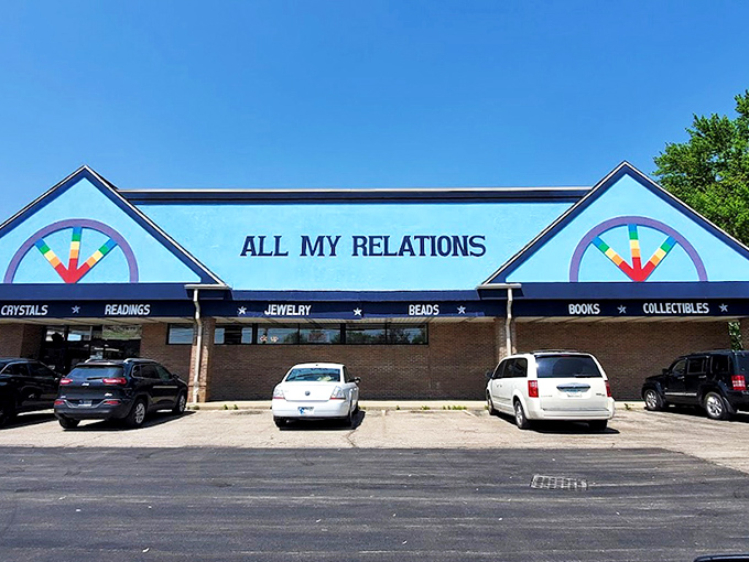 The rainbow-painted facade promises cosmic adventures within, where "CRYSTALS" and "READINGS" boldly announce this isn't your average strip mall tenant.