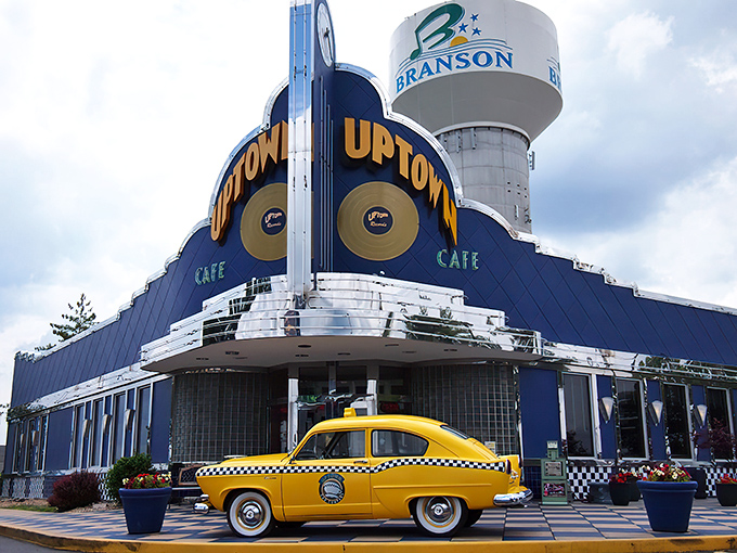 The neon-drenched Art Deco façade of Jackie B. Goode's glows like a beacon for hungry time travelers, complete with that perfect vintage yellow cab parked outside.