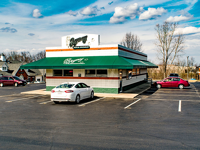The white-tiled time machine with its signature green awning beckons hungry travelers. This isn't retro by design—it simply never stopped being wonderful.