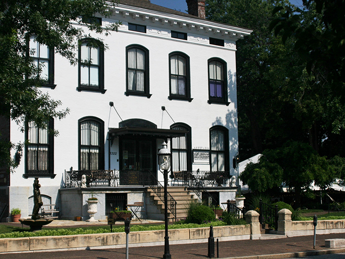 The Lemp Mansion after dark is when the real show begins. Those glowing windows aren't just architectural features—they're portals where the past peers into our present.