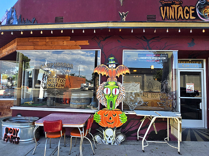 The vintage shop exterior glows with retro charm, beckoning curious souls with its crimson façade and twinkling carnival lights. Adventure awaits!