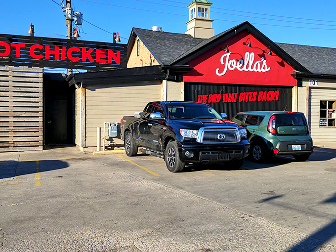 The Bird That Bites Back! isn't just a catchy slogan—it's a fiery promise painted across Joella's distinctive red facade that beckons heat-seekers from miles around.