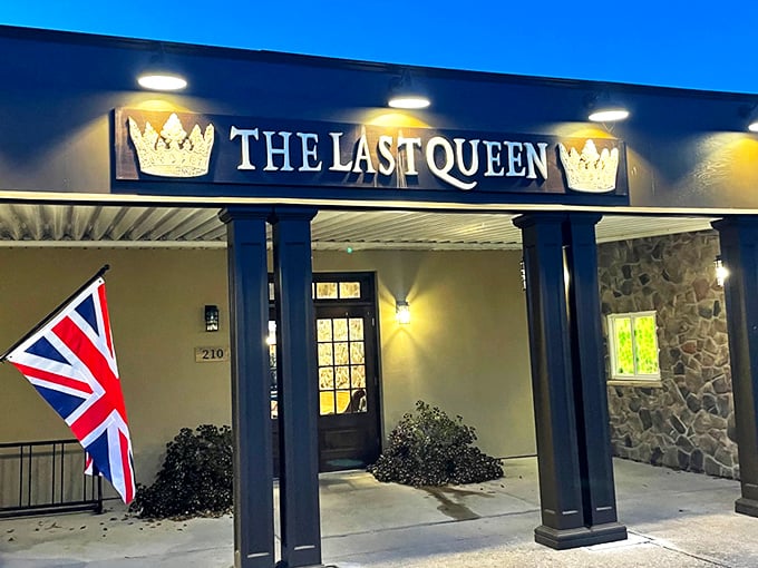 The Last Queen stands proudly in Enon, its stone facade and British flag promising an authentic pub experience that feels worlds away from Ohio cornfields.