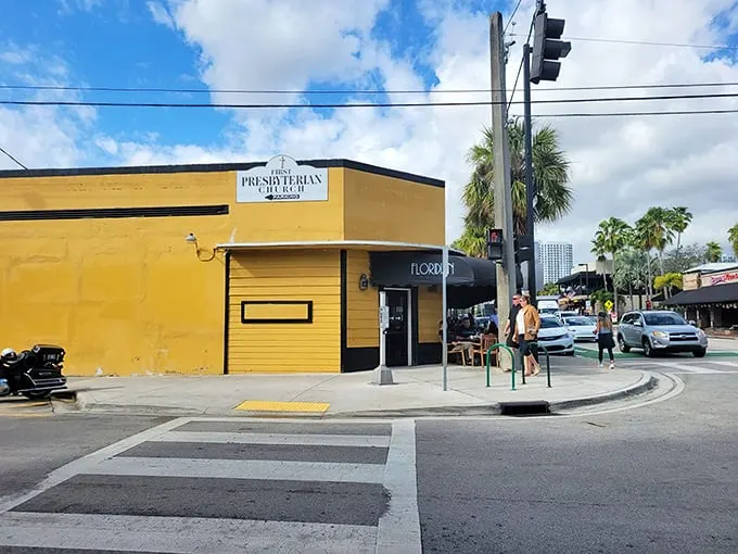 The sunshine-yellow exterior stands like a beacon of breakfast hope on Las Olas Boulevard, promising culinary salvation to the hungry masses of Fort Lauderdale.