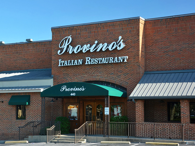 The iconic brick façade and emerald awning of Provino's stands as a beacon of hope for the pasta-deprived masses of Kennesaw.