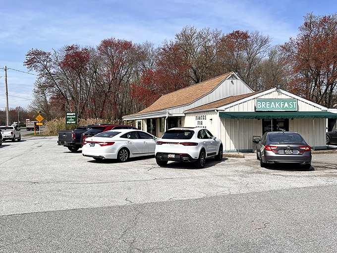 The unassuming exterior of Guilday's stands like a breakfast beacon in Newark, promising pancake perfection behind its humble white walls.