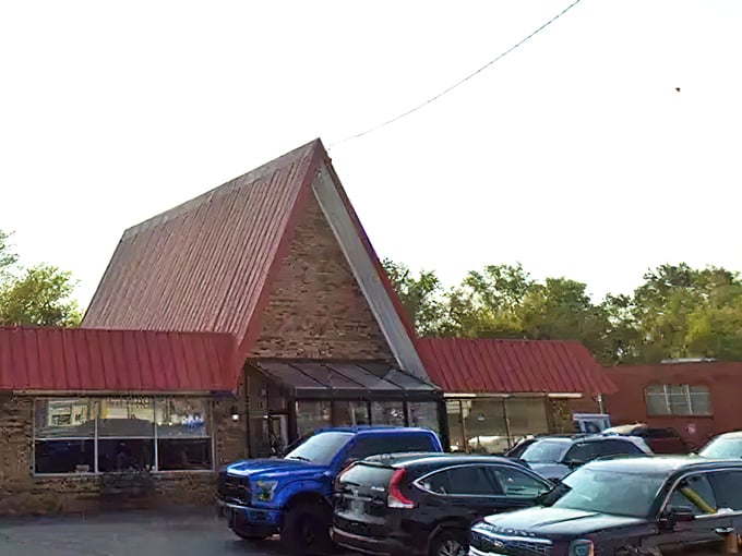 The iconic A-frame roof of G's Pancake House stands like a breakfast beacon, promising comfort food that'll make your morning infinitely better.