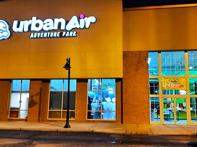 The climbing walls at Urban Air offer a Tetris-like challenge with colorful handholds. Who knew scaling a brick facade could be this much fun?