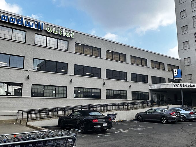 The unassuming white façade of MERS Goodwill Outlet on Market Street – like finding out Clark Kent is actually Superman when you step inside.