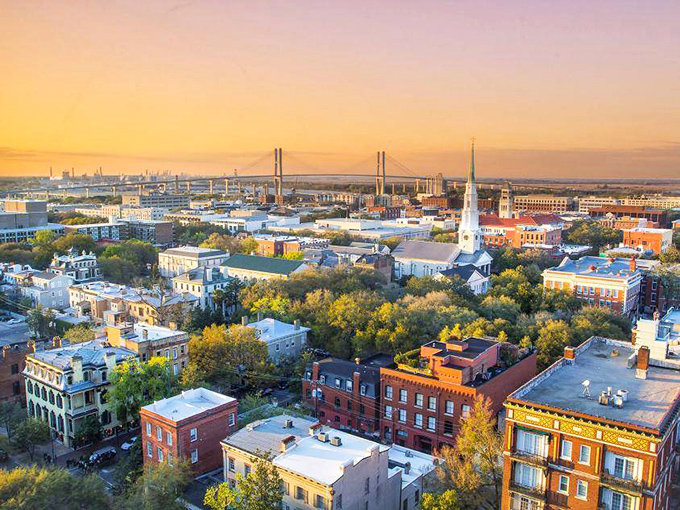 Savannah's historic district, where cobblestone streets and trolley tracks remind you that some places refuse to surrender their charm to modern inconveniences. 
