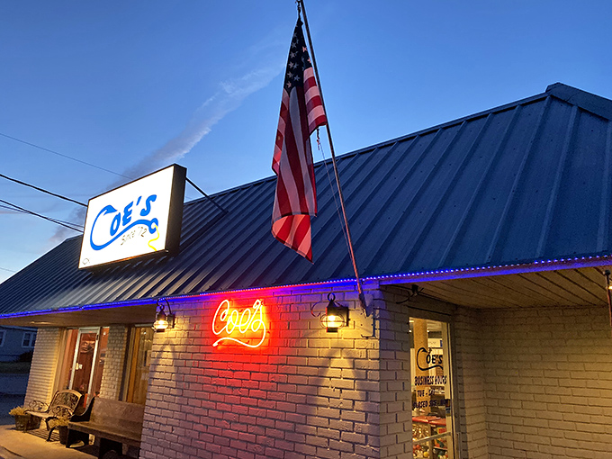 The unassuming blue-roofed exterior of Coe's Steak House stands like a beacon for hungry travelers. Kentucky's culinary treasures often hide in plain sight.