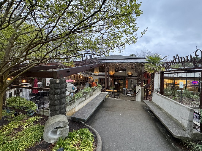 A slice of Bavaria in Durham! This charming outdoor patio is where lederhosen meets Southern hospitality, complete with red umbrellas that pop like cherry tomatoes in a garden salad.