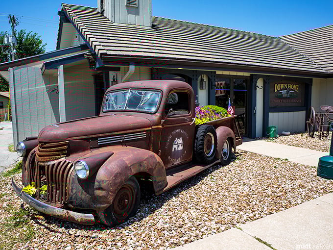 The vintage pickup truck outside Down Home Family Restaurant isn't just decoration—it's a time machine to when food was honest and portions were heroic.