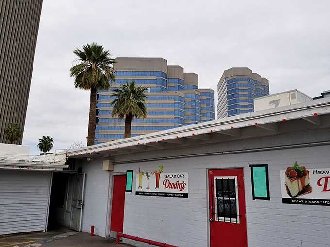 The iconic pink exterior of Durant's stands proudly on Central Avenue, a mid-century mirage in downtown Phoenix's urban landscape.