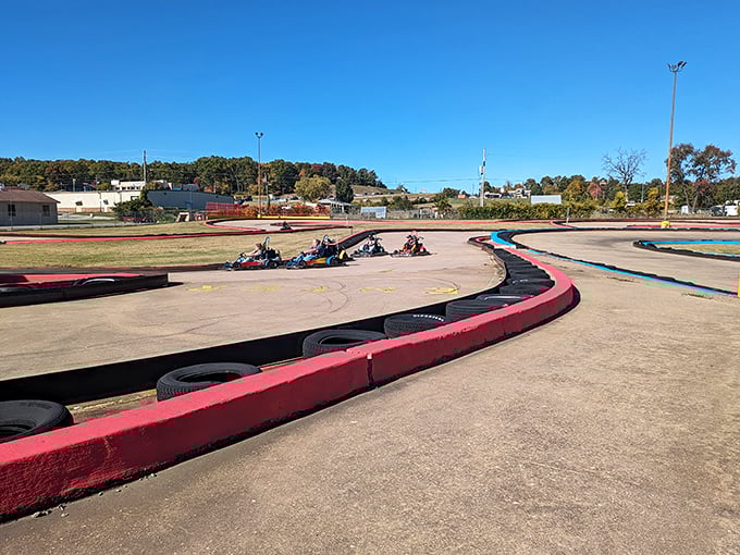The winding track at Lokomotion beckons speed demons of all ages. Those red and blue barriers aren't just for show—they've caught many an overzealous driver with NASCAR dreams.
