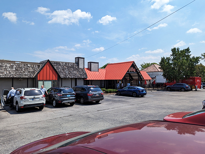 The iconic red-roofed entrance promises burger nirvana within. "Perfect burgers, built from scratch" isn't just a slogan—it's a Louisville guarantee