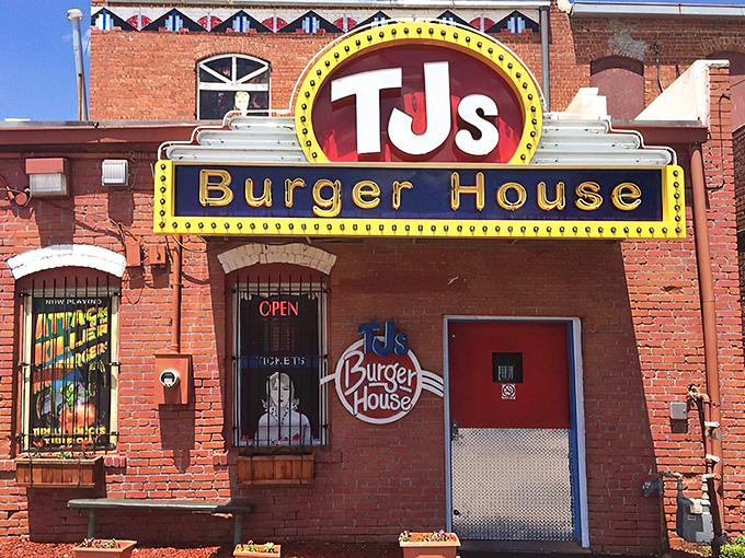 That iconic yellow and red sign against classic brick isn't just restaurant signage—it's a beacon of burger hope for hungry Kansans everywhere.