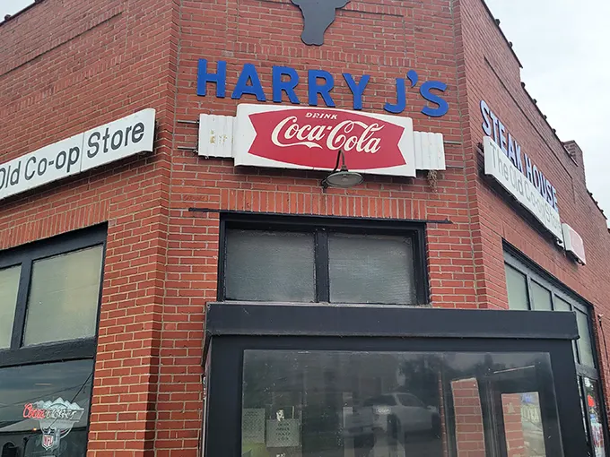 The humble brick exterior of Harry J's Steakhouse belies the culinary treasures within, a classic case of "don't judge a steak by its storefront."