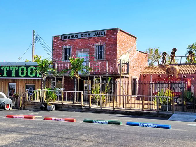 The "Uranus City Jail" stands as a quirky centerpiece of this roadside attraction, where kitschy Americana meets carnival culture with unapologetic pride.