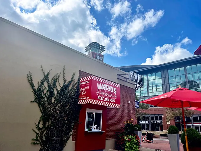 The unassuming brick exterior of Wario's might not scream "food destination," but that red checkered sign is like a beacon for sandwich aficionados across Columbus.