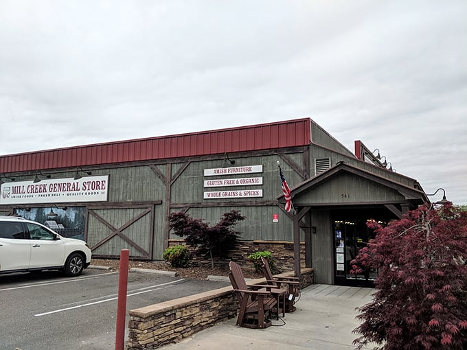 The unassuming exterior of Mill Creek General Store – where culinary treasures hide behind a humble façade that wouldn't look out of place in a Norman Rockwell painting. 