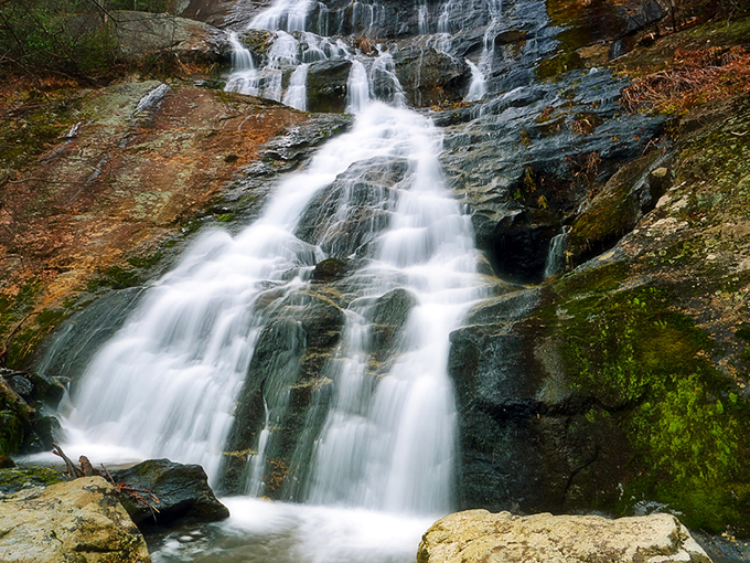 Nature's own water feature—Crabtree Falls cascades down ancient rock faces like liquid crystal, catching sunlight in ways no home fountain could ever dream of matching.