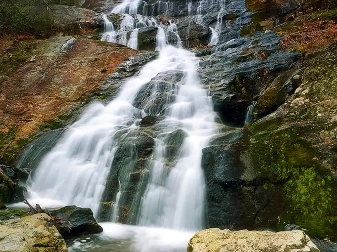 Nature's own water feature—Crabtree Falls cascades down ancient rock faces like liquid crystal, catching sunlight in ways no home fountain could ever dream of matching.