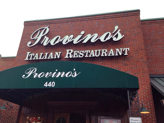 The iconic brick façade and emerald awning of Provino's stands as a beacon of hope for the pasta-deprived masses of Kennesaw.