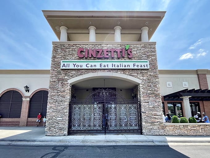 The stone facade of Cinzetti's stands like a Tuscan embassy in suburban Kansas, promising culinary diplomacy between Italy and the Midwest.