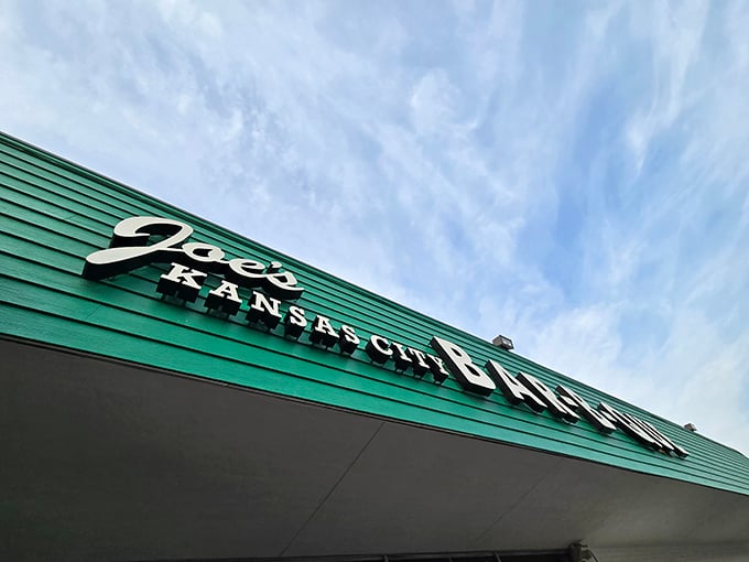 The iconic green exterior of Joe's Kansas City Bar-B-Que stands as a beacon of hope for hungry travelers—proof that extraordinary food often hides in ordinary places.