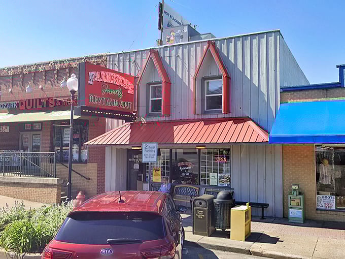 The weathered wood siding and red-trimmed windows aren't trying to impress anyone, yet the line of hungry patrons tells you everything you need to know.