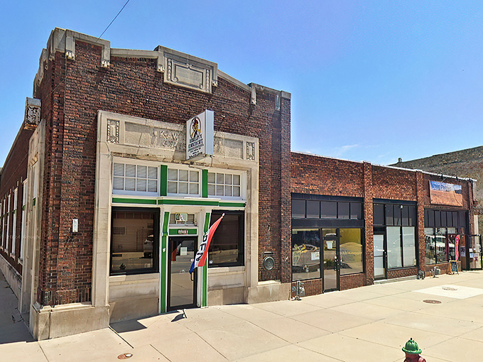 The iconic signage of Bradley's Corner Cafe beckons hungry travelers like a culinary lighthouse in downtown Topeka.