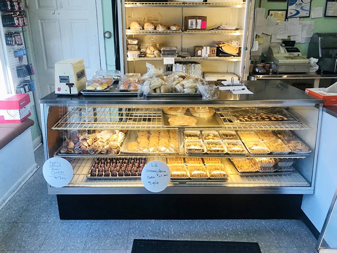 Another display case, another existential crisis about how many treats you can reasonably order without judgment from strangers.