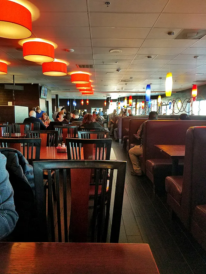 Families gather in booths where important decisions are made—like whether to get a third plate or save room for dessert.