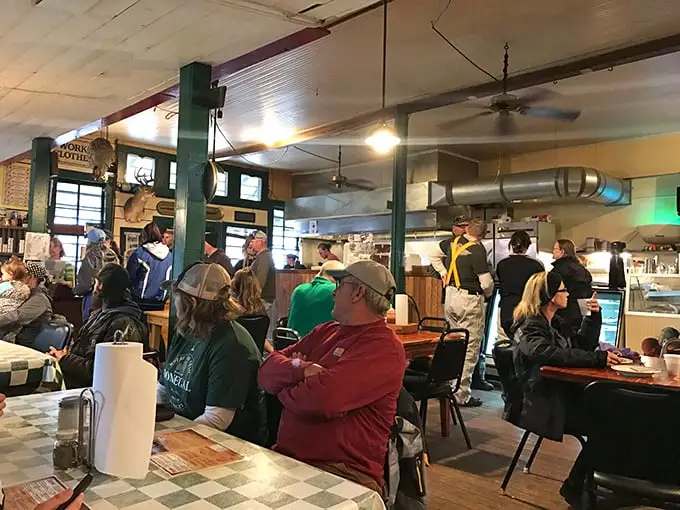 When strangers become temporary friends – the true magic of Oark happens when bikers, hikers, and locals share tables and stories.