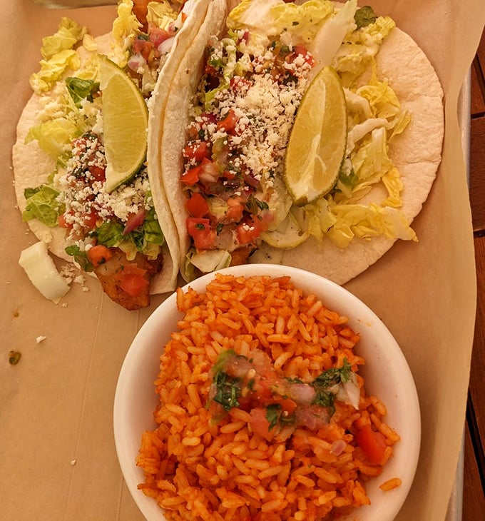 These tacos don't just feed you—they transport you. Bright lime, fresh vegetables, and Spanish rice create a fiesta that feels both authentic and uniquely Colorado.