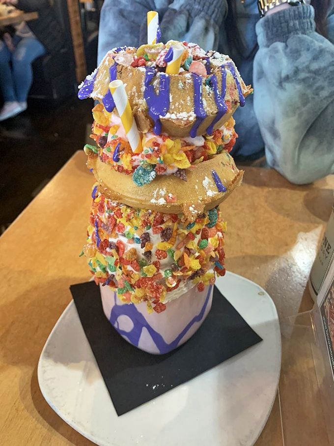 This isn't a milkshake—it's a carnival that requires a spoon, straw, and possibly a building permit. The Fruity Pebbles shake defies both gravity and restraint.