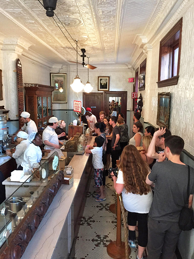 The line isn't a wait—it's part of the pilgrimage. These ice cream devotees know that patience makes the first lick even sweeter.