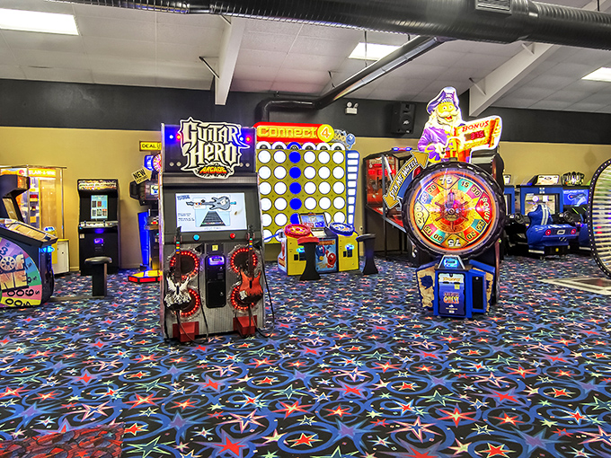 The arcade—where quarters disappear faster than cake at a birthday party. Guitar Hero still reigns supreme in this neon-lit kingdom of beeps and boops.