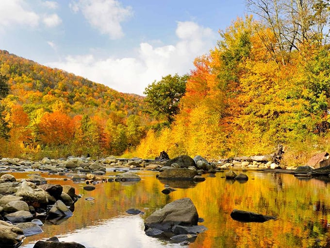 Fall transforms the landscape into nature's own color palette, with reflections creating a double dose of autumn splendor that would make any leaf-peeper weak at the knees.