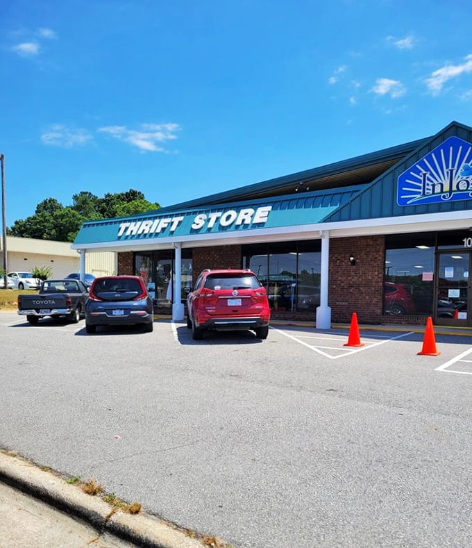 InJoy's blue sunburst logo radiates positive shopping vibes. Thrifting with a side of sunshine!