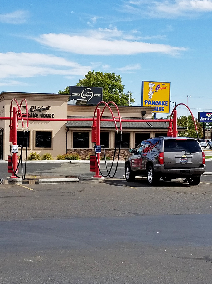 The Original Pancake House doesn't need flashy gimmicks—just those signature red arches that say "pancake royalty resides here." A breakfast palace in strip mall clothing.