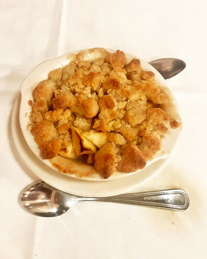 Not your school cafeteria's apple crumble – this warm, buttery creation sings sweet songs to your dessert-loving soul.