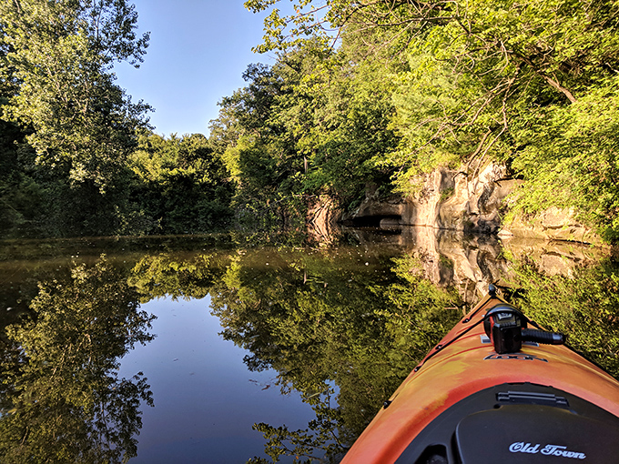 Kayaking through mirror-like waters with sandstone cliffs as your backdrop—the closest thing to paddling through a living postcard.