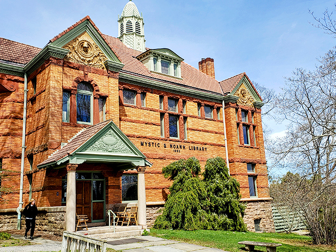 The Mystic & Noank Library's Romanesque architecture houses stories of the sea and shore—a literary lighthouse in a town built on narratives.